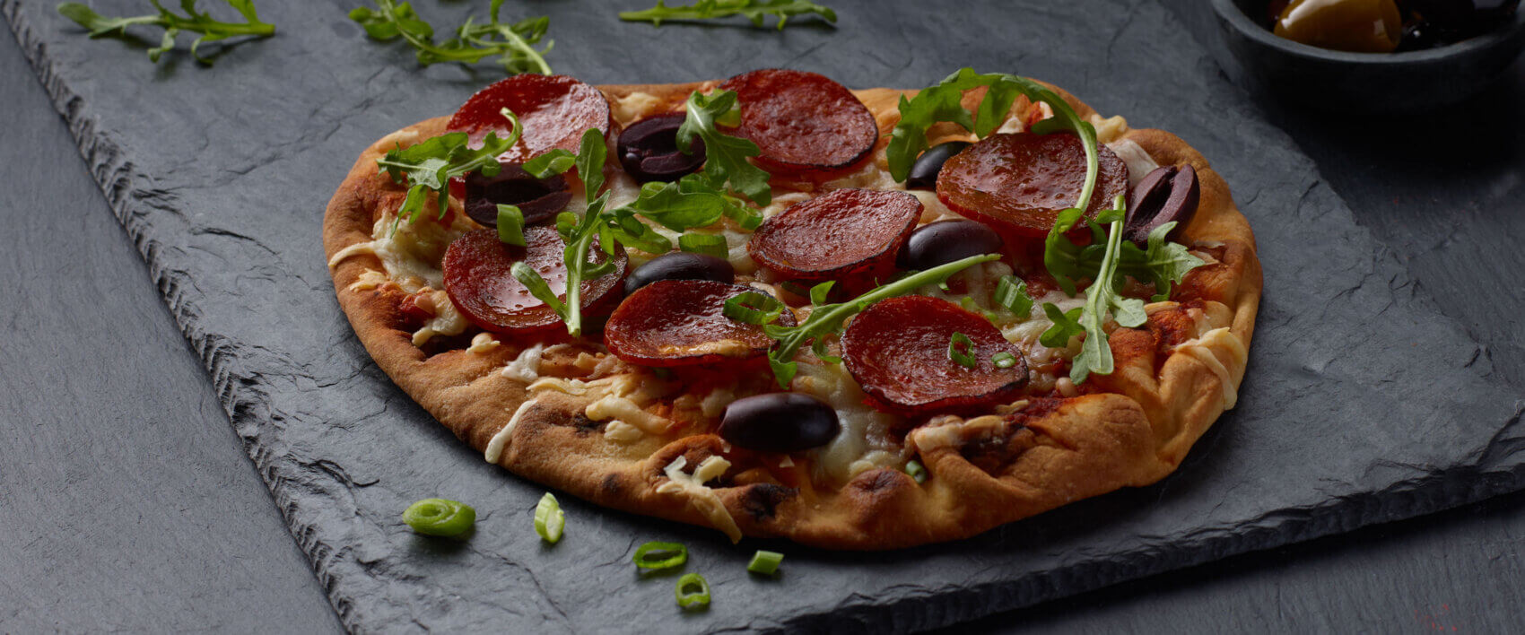 Sliced Spicy Salami Spanish Flatbread - HORMEL® Pepperoni