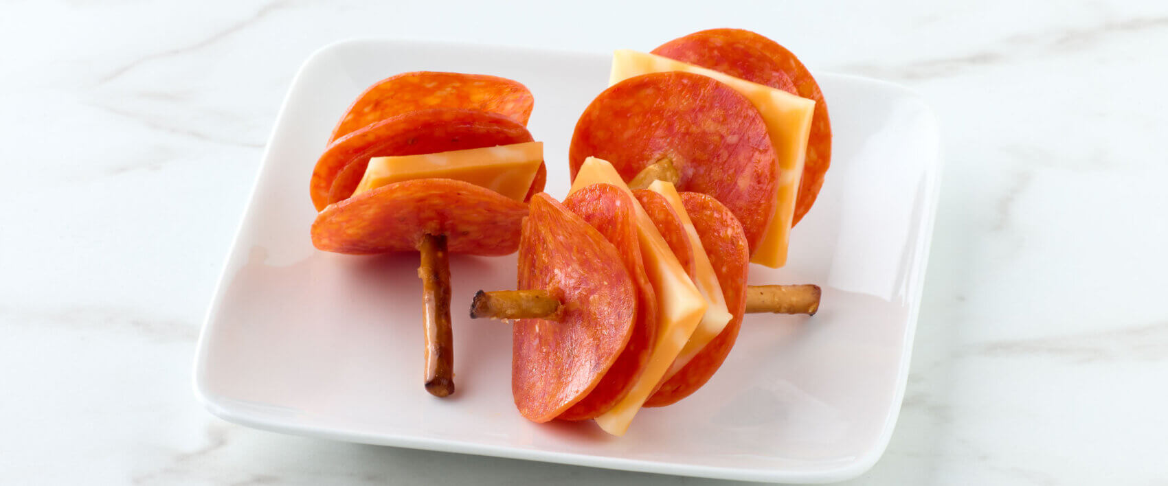 Pepperoni and Cheese Pretzel Skewers - HORMEL® Pepperoni